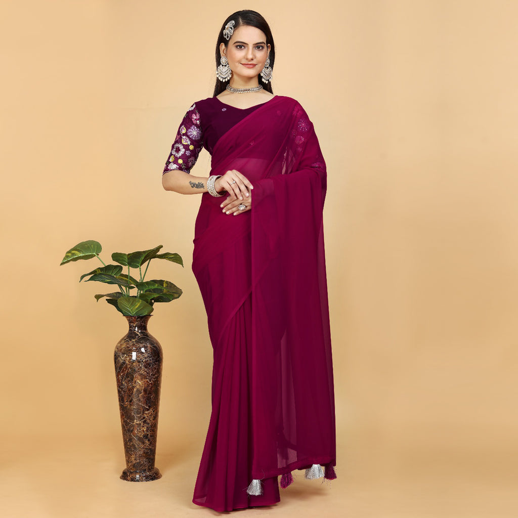 Pink Solid Georgette Saree With Tassels