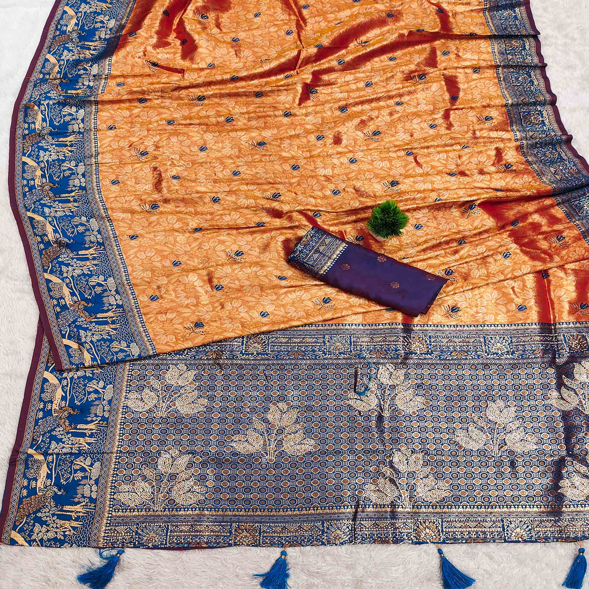 Rusty Orange Silk Blend Saree Featuring Elegant Floral Weaving Work