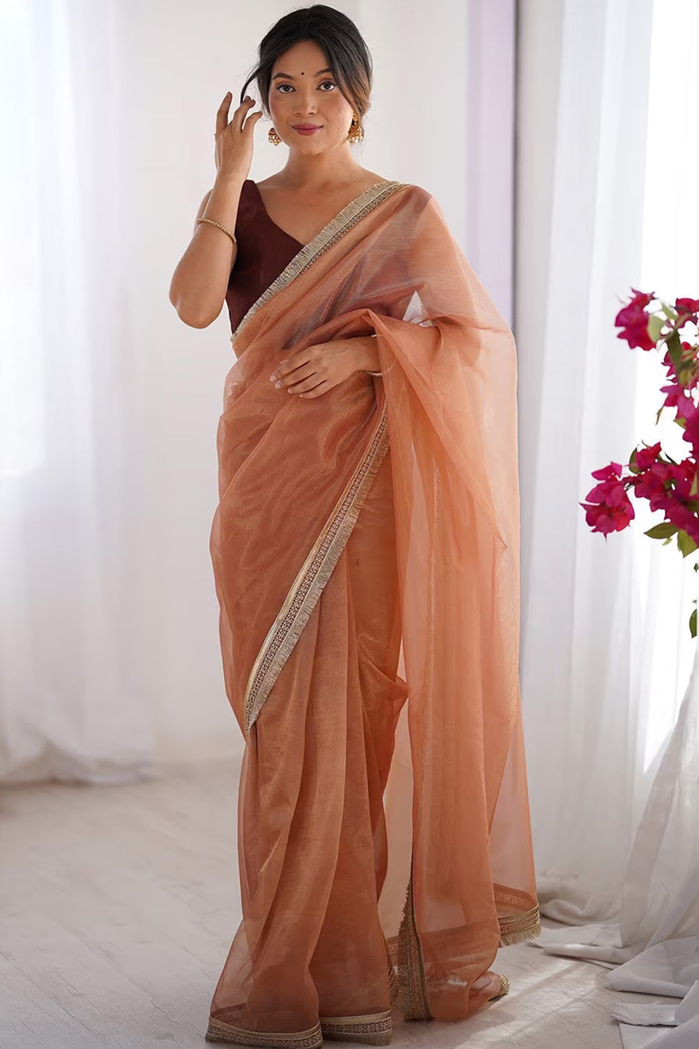 Brown Solid Pattern Net Saree with Refined Lace Work for Parties
