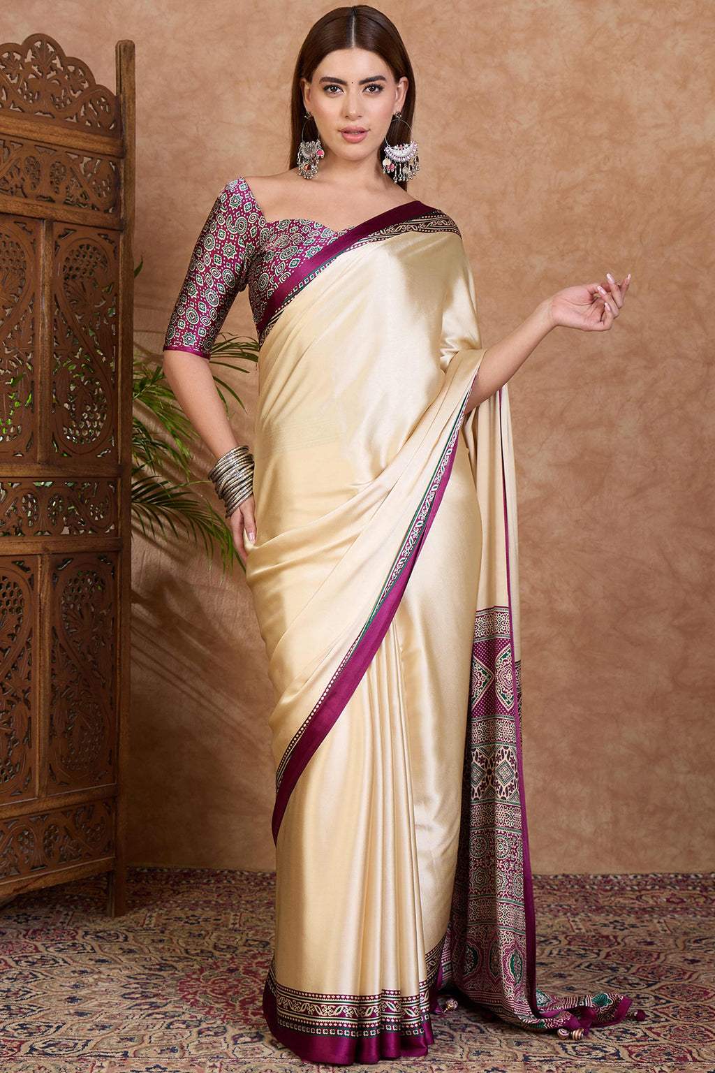 Cream & Wine Modal Satin Saree Featuring a Solid Base and Artisanal Aj