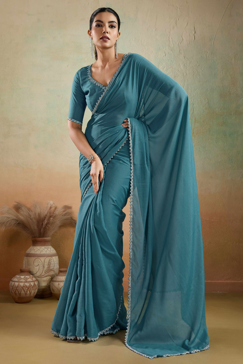 Teal Blue Solid Matt Georgette Saree With Ceramic Embellished Lace Bor