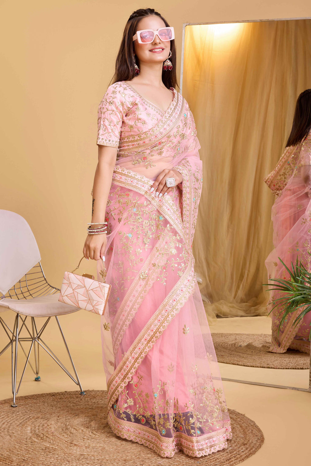 Baby Pink Soft Net Saree With Delicate Floral Embroidery & Shimmering