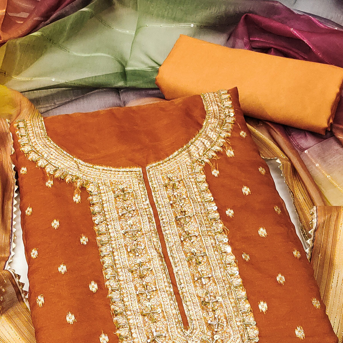 Rust Butti Design Woven Organza Dress Material