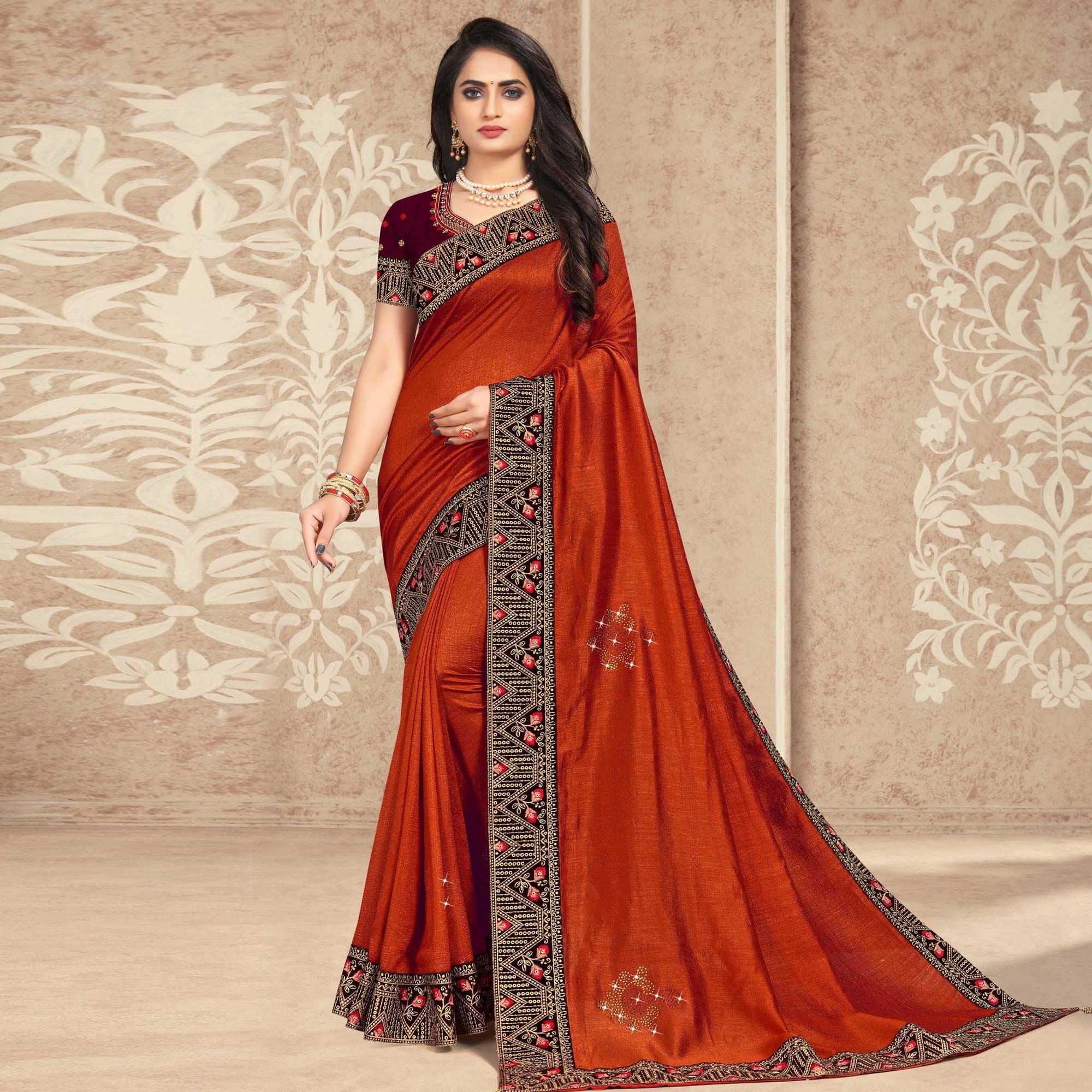 Rust Embellished Vichitra Silk Saree